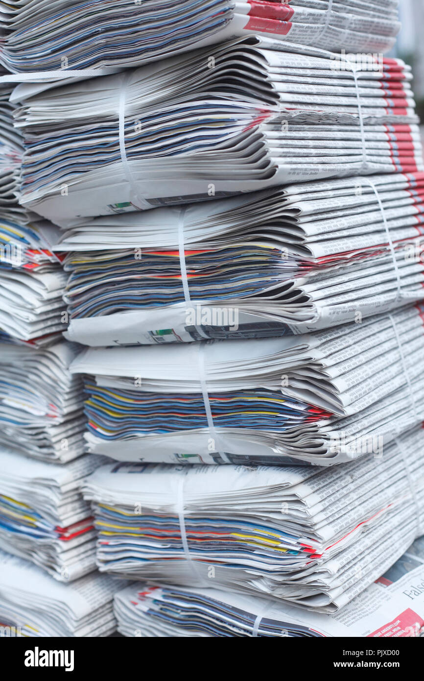 Newspaper pile of daily newspapers, background, texture Stock Photo - Alamy
