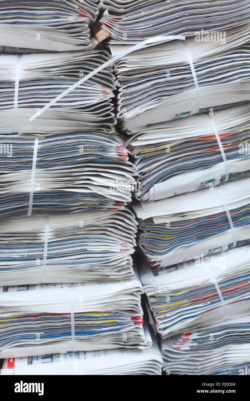 Newspaper pile of daily newspapers, background, texture Stock Photo - Alamy