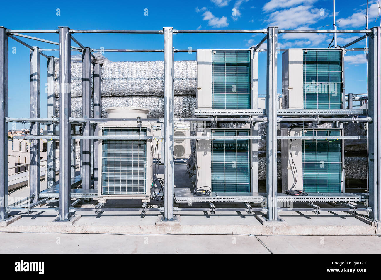 Air conditioning system assembled and installed on top of the building ...