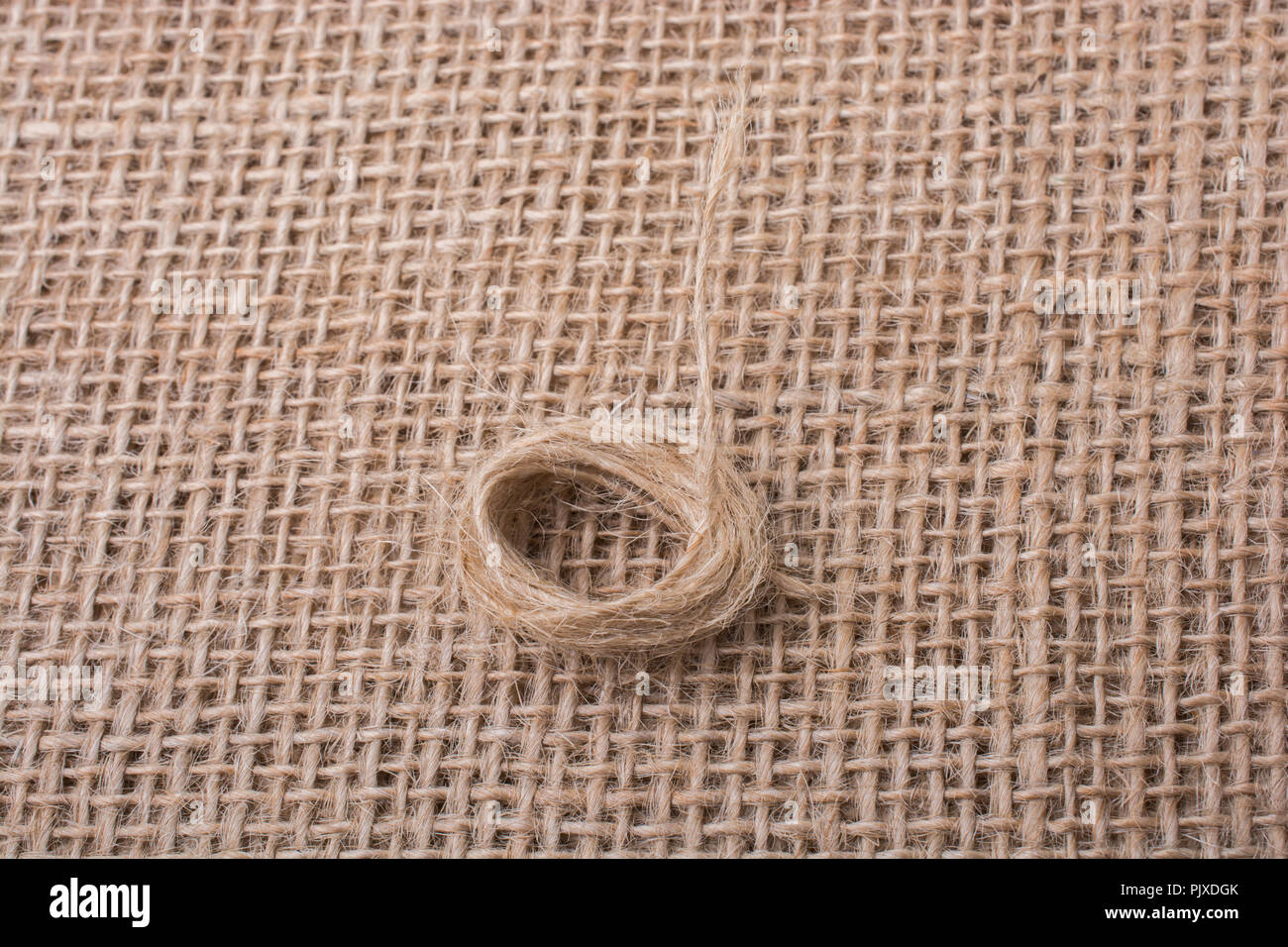 Roll of brown color linen string paper background Stock Photo - Alamy