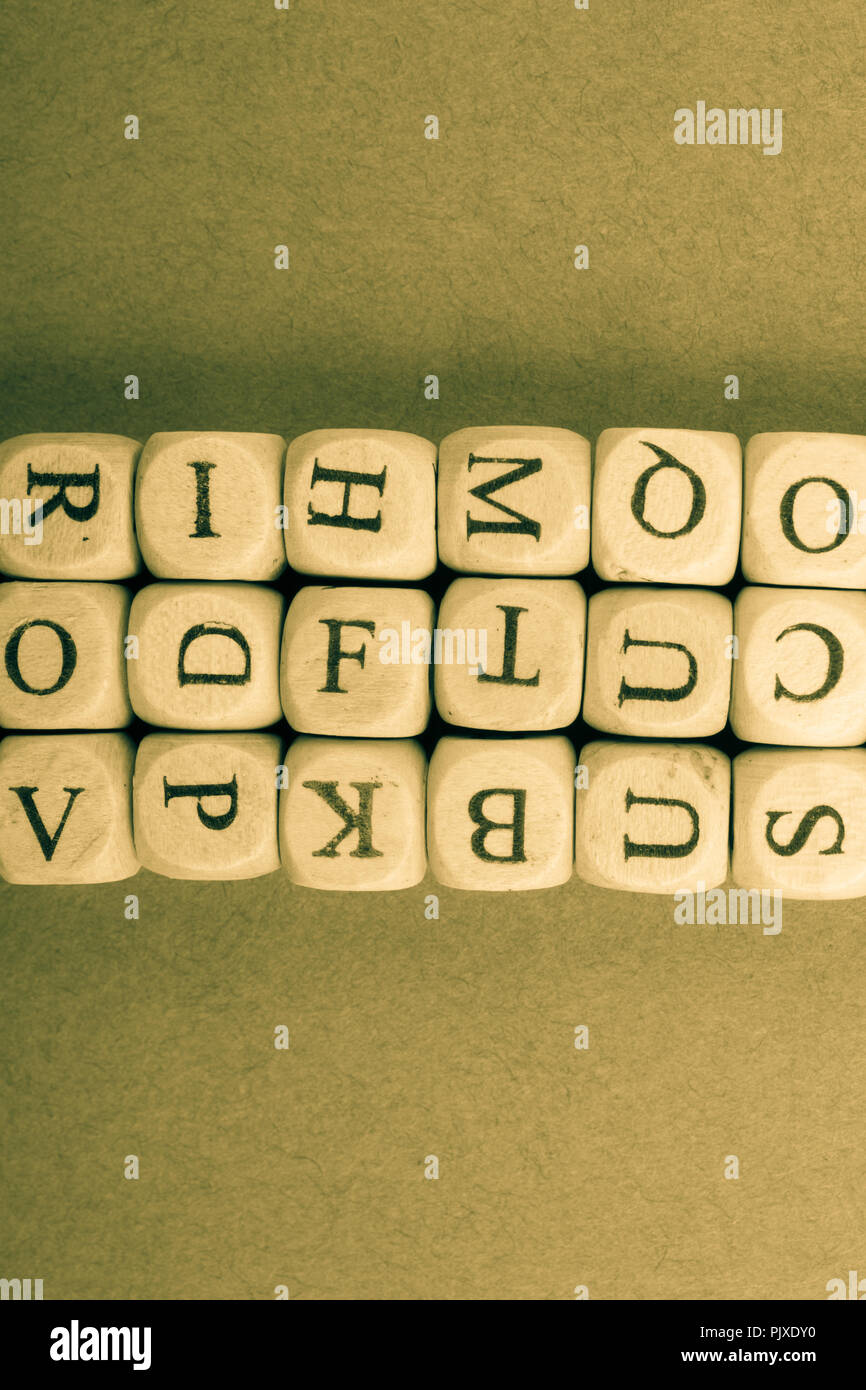 Letter cubes of Alphabet made of wood Stock Photo - Alamy