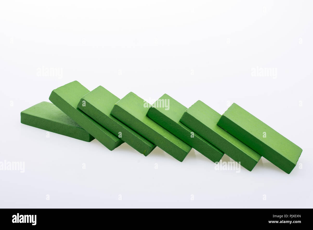 Colorful Domino Blocks in a line on a white background Stock Photo - Alamy