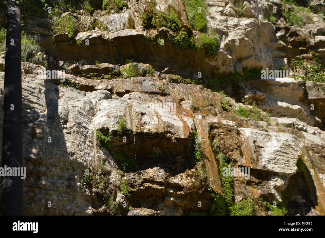 A thin stream of water on the dried waterfall Wuchang-su, Crimea June ...