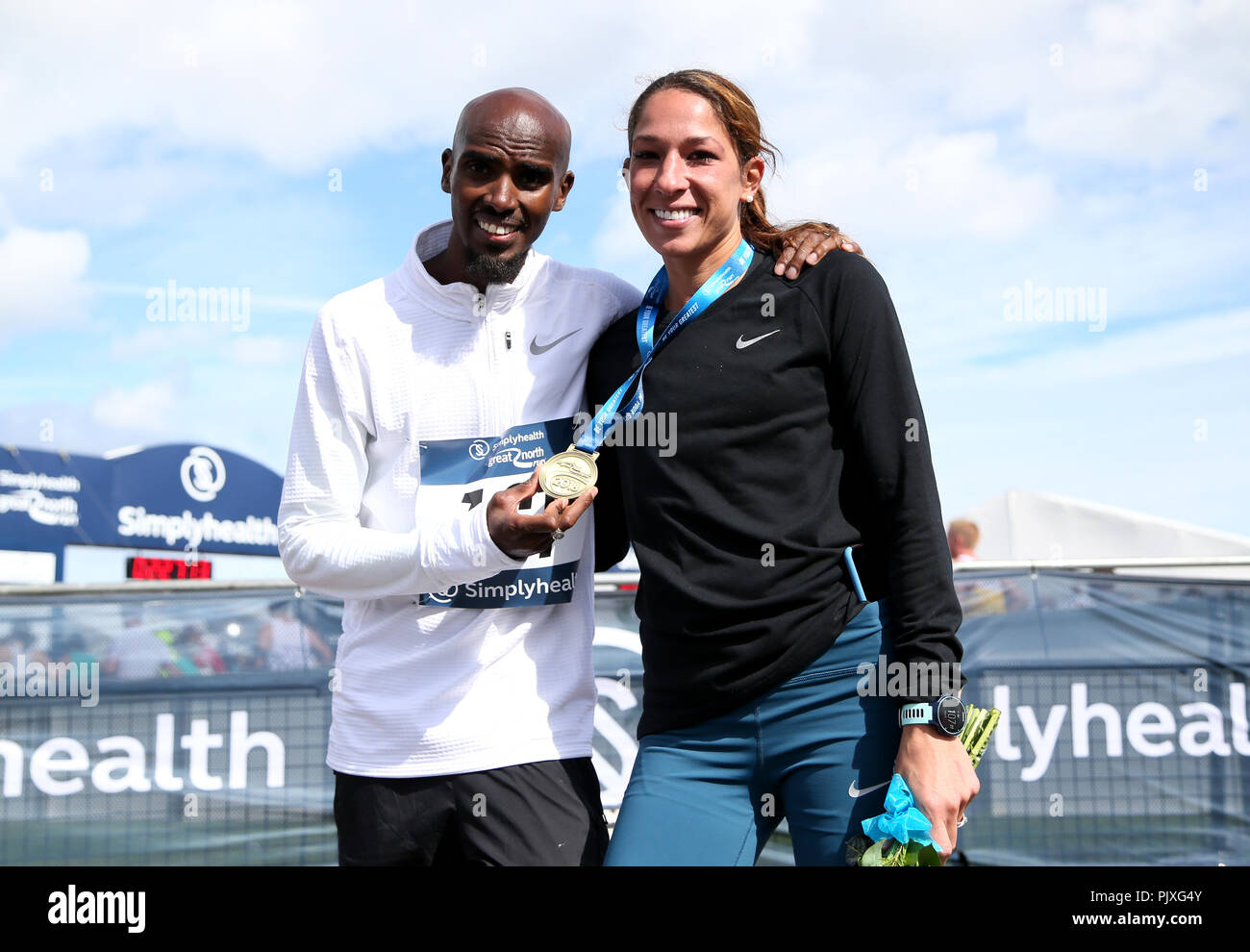 Sir Mo Farah and Wife Tania Nell after completing the 2018 Simply ...
