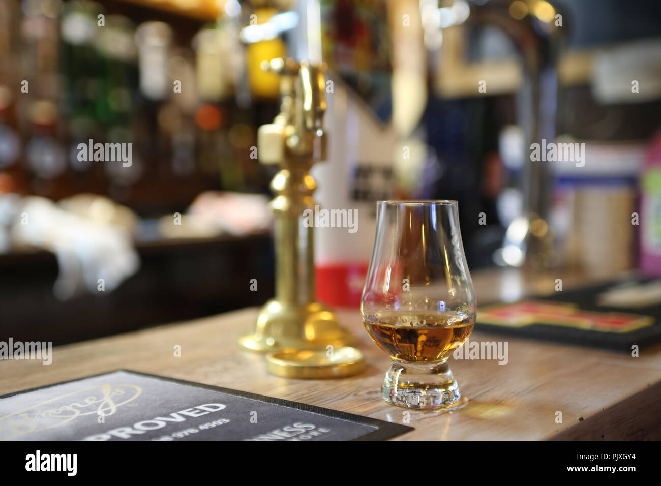 A glass of spirit / Un verre de spirit Stock Photo - Alamy