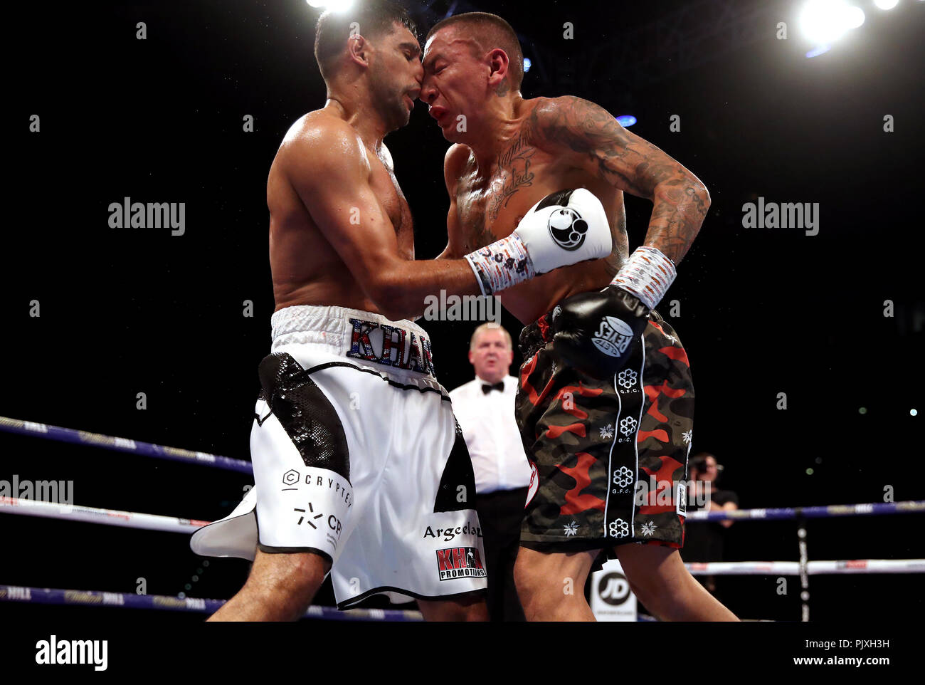 Amir Khan (left) and Samuel Vargas in action during their Welterweight ...