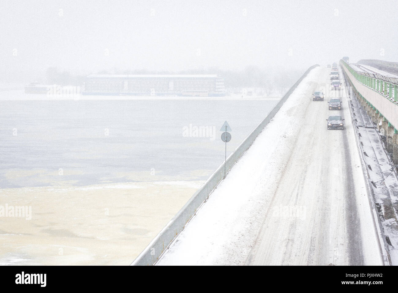Snow storm on the roads in December in Kiev, Ukraine. Snowy and nothing ...