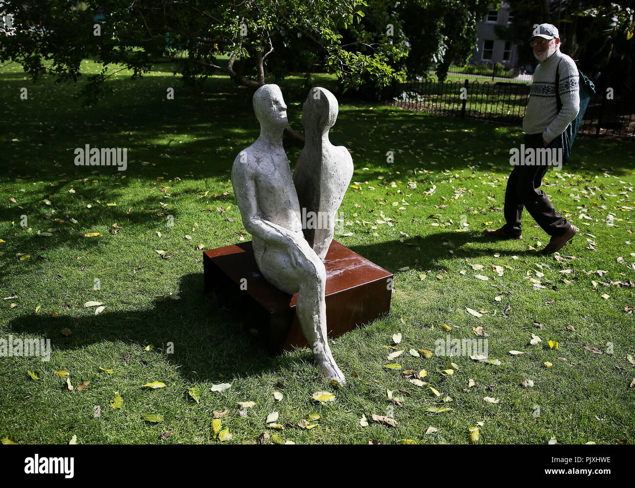 A man looks at 'Same Same Different' by Brian Synnott which forms part ...