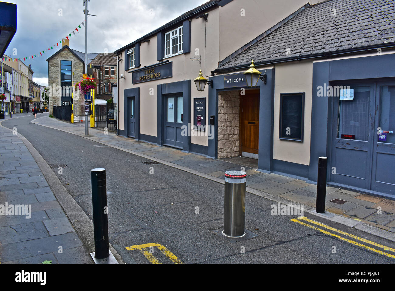 Rising bollards protect and restrict town centre access via Queen ...