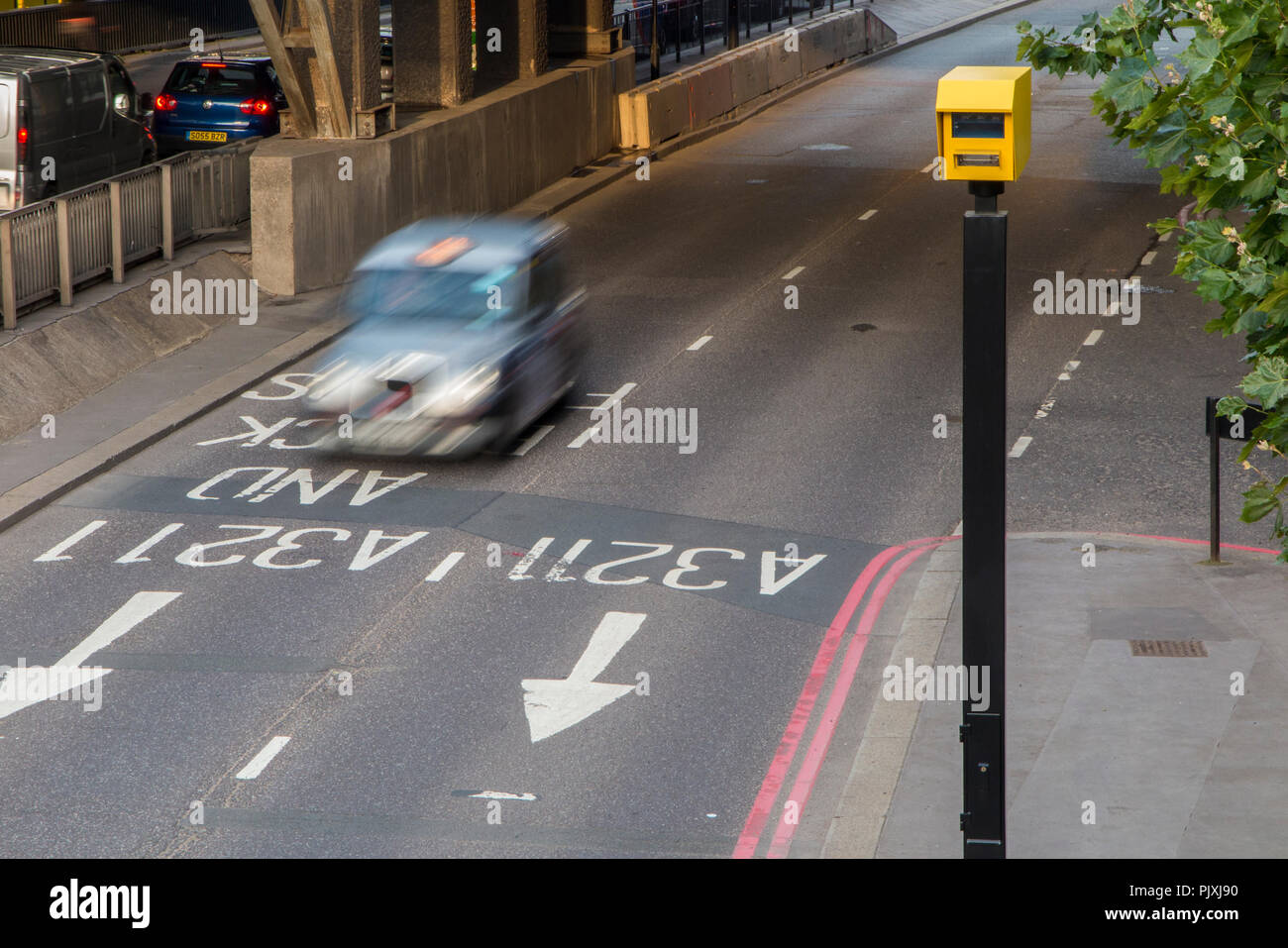 cars speeding through a speed trap in central London Stock Photo - Alamy