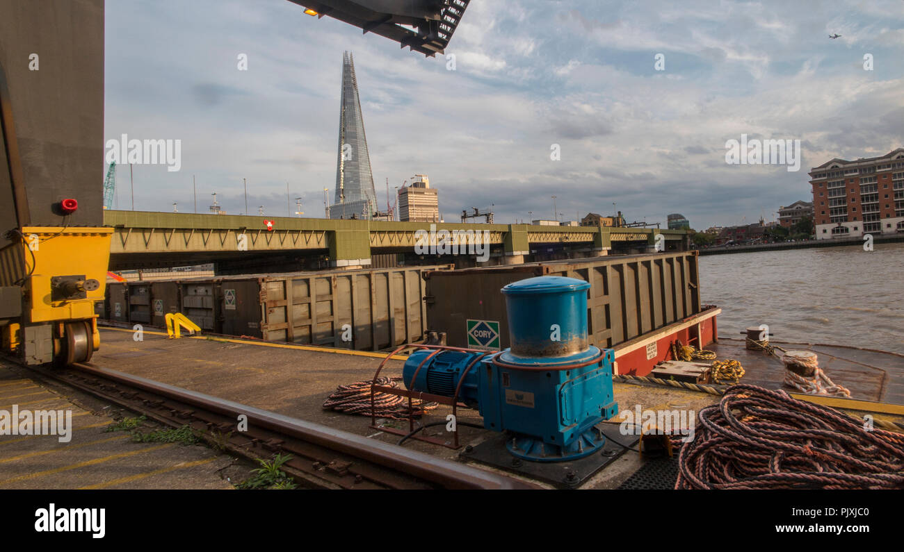 The Shard and the River Thames, framed by an industrial unit in Central ...