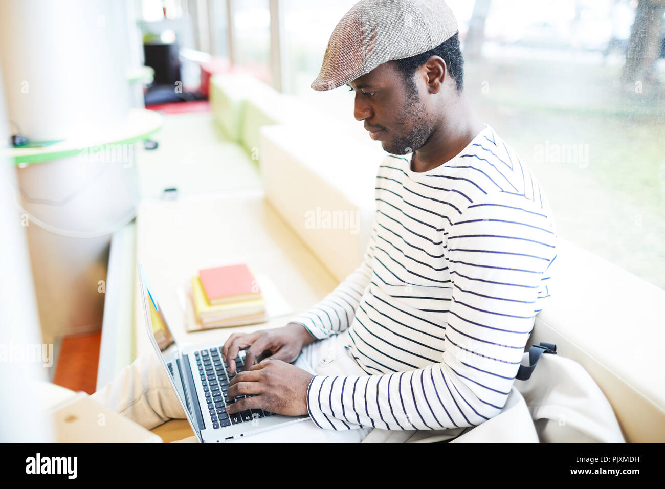 College student typing hi-res stock photography and images - Alamy