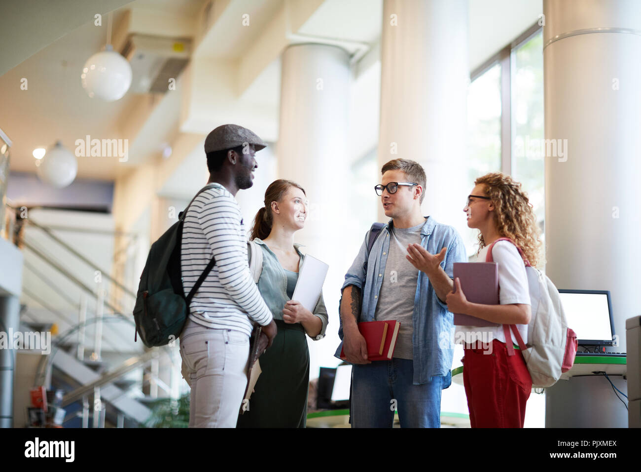 Discussing home task Stock Photo - Alamy