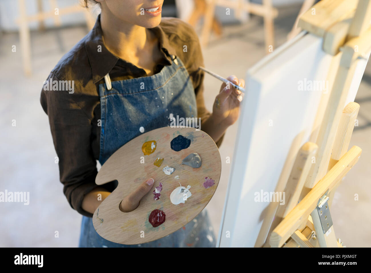 Painting on easel Stock Photo - Alamy