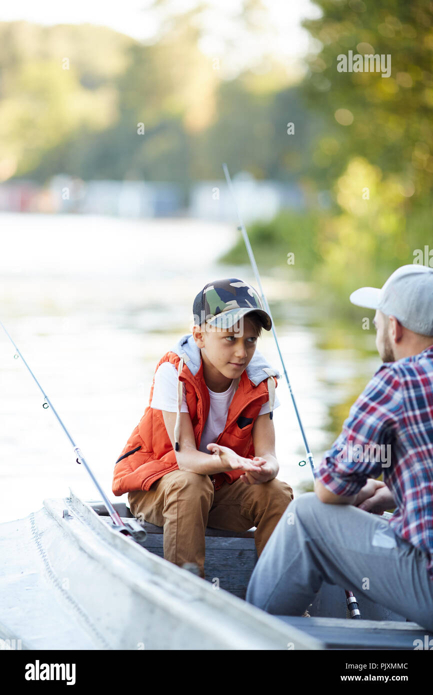 Boy asking dad Stock Photo - Alamy