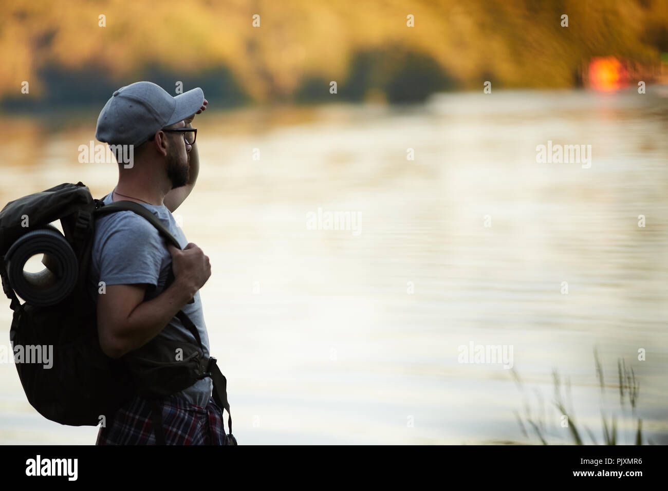 Sunset by river Stock Photo - Alamy