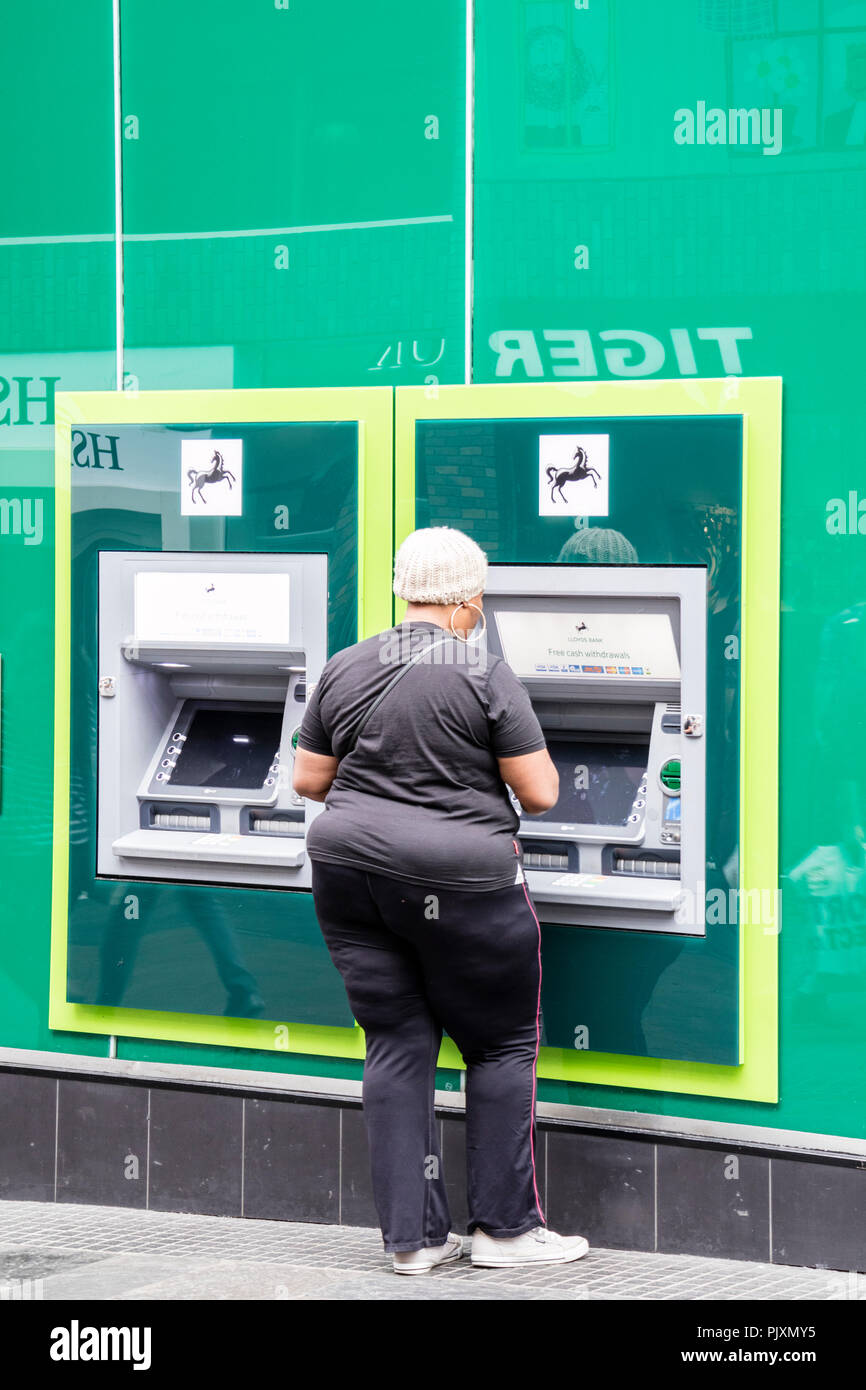 Lady At Cash Machine High Resolution Stock Photography and Images - Alamy
