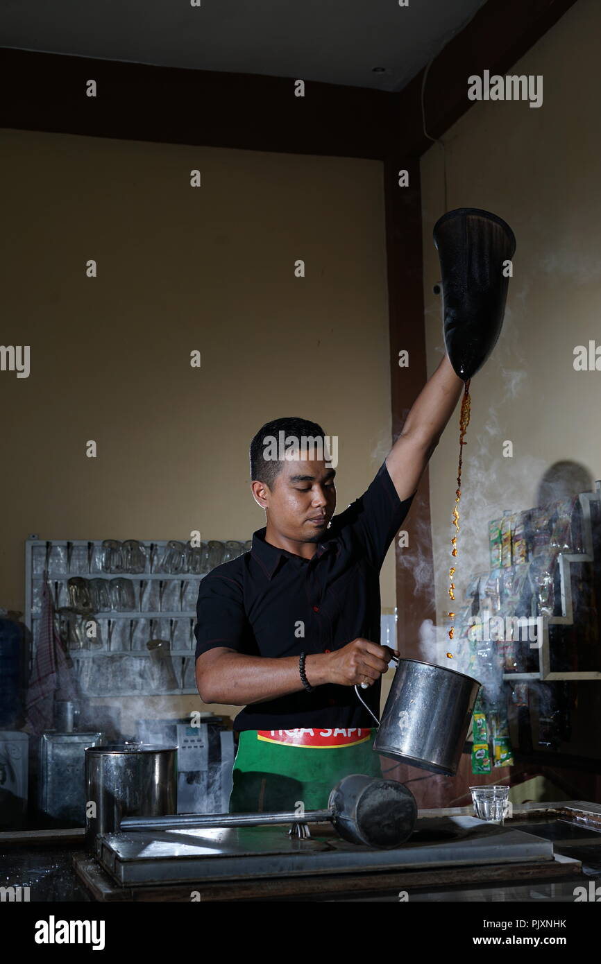 Traditional process of Aceh coffee making by Barista at Local Coffee ...