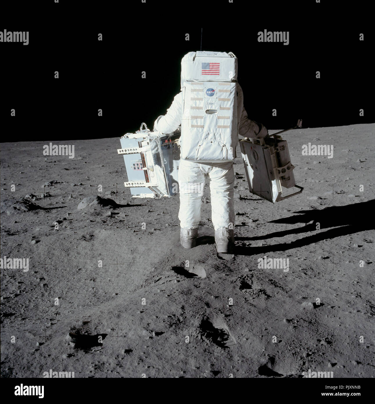 The Moon - (FILE) -- Astronaut Edwin E. "Buzz" Aldrin carries ...