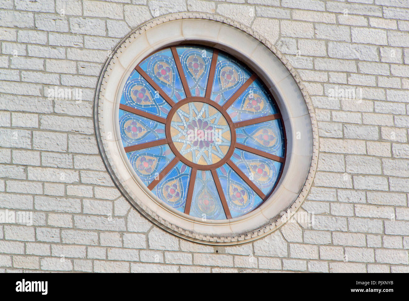 The colorful mosaic window on the Catholic Church Stock Photo - Alamy