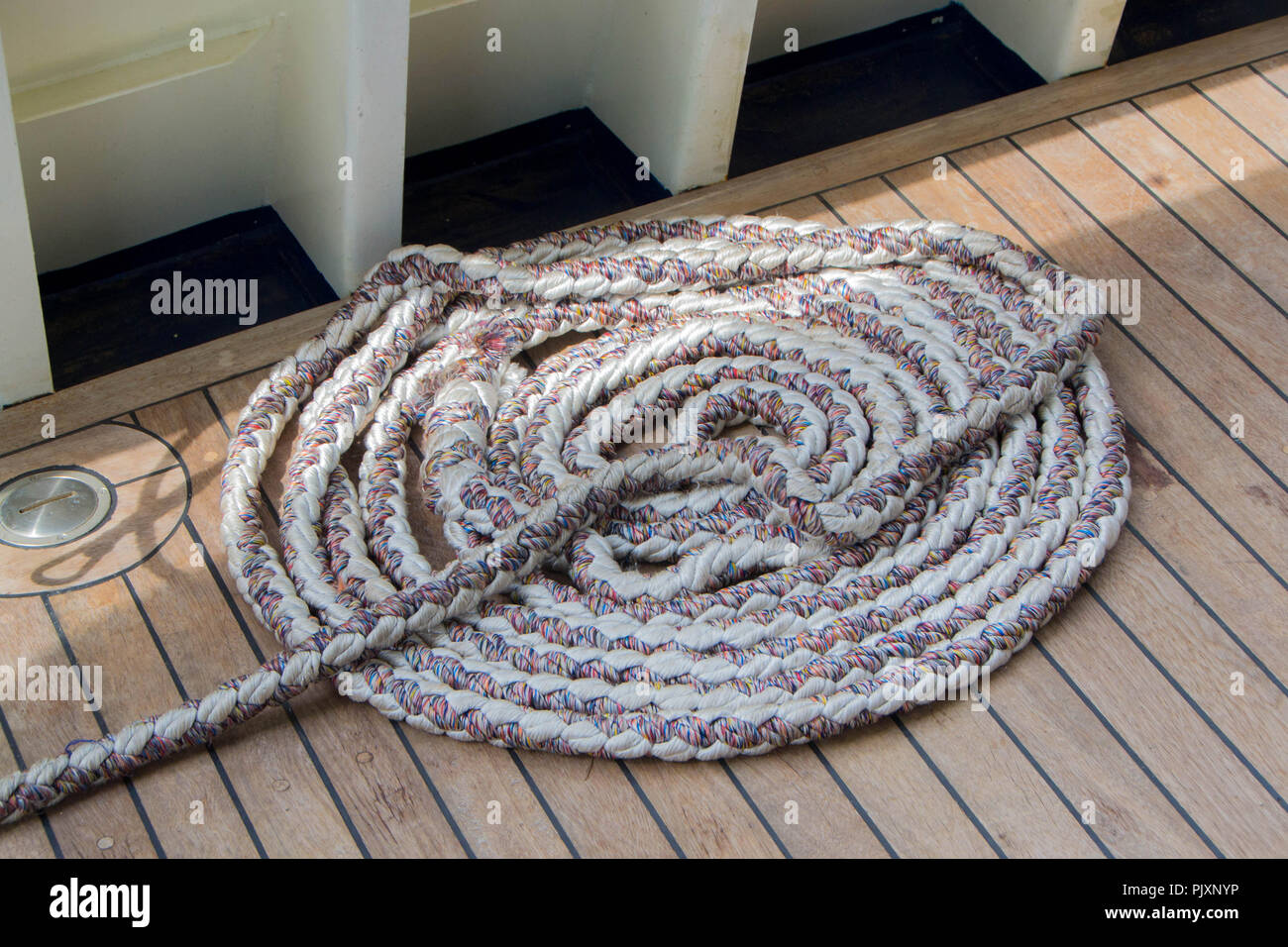 A colorful boat rope arranged in a circle and ready for use Stock Photo ...