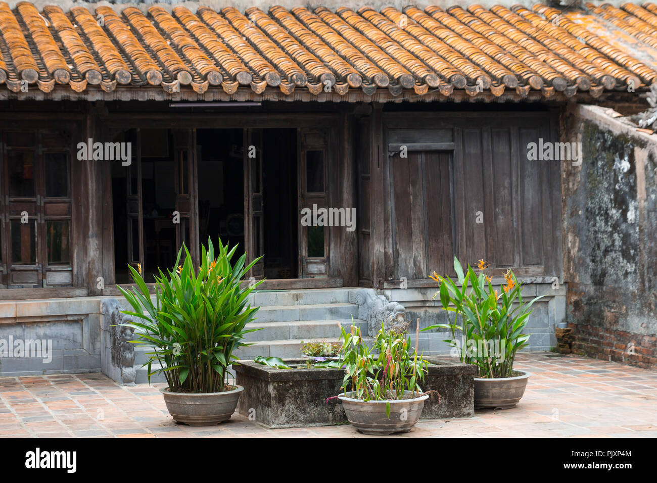 ancient asian architecture wood timber house Stock Photo - Alamy
