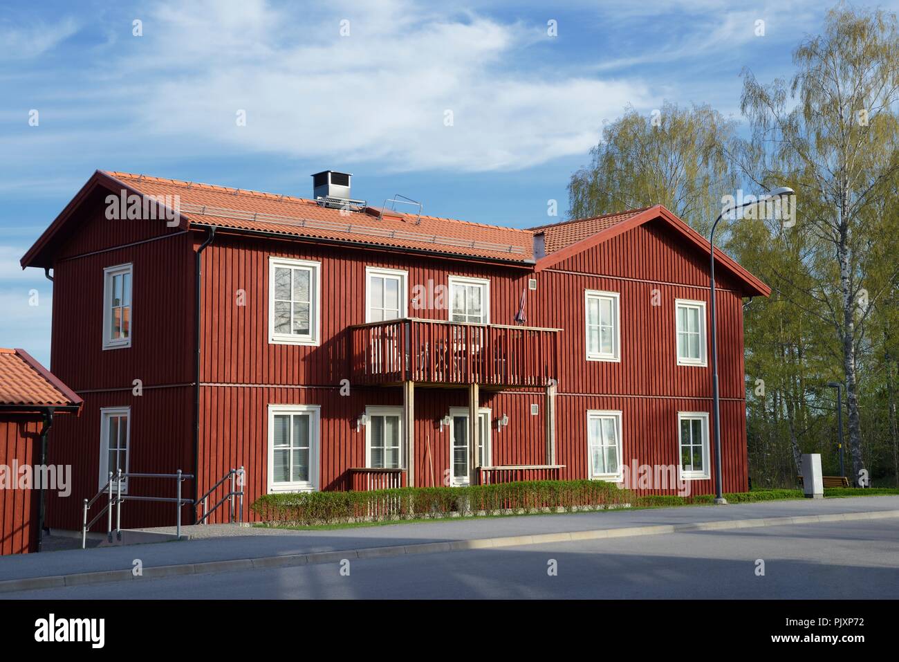 Scandinavian housing, classic red villa with blue sky Stock Photo - Alamy