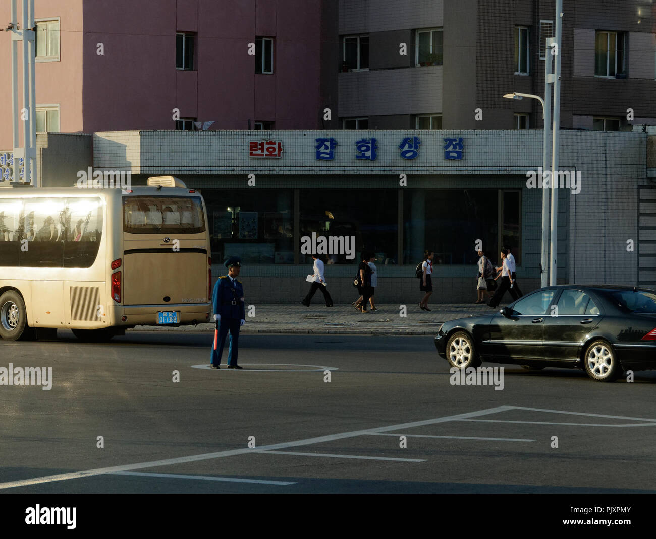 North Korean traffic officer directing traffic, Pyongyang, North Korea ...