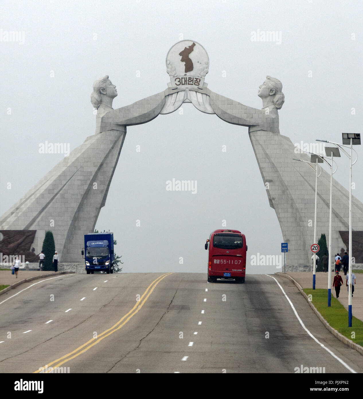Tourist buses heading to the DMZ under The Arch of Reunification ...