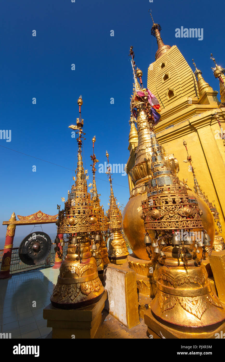 The golden stupa of the buddhist monastery at the top of the pedestal ...