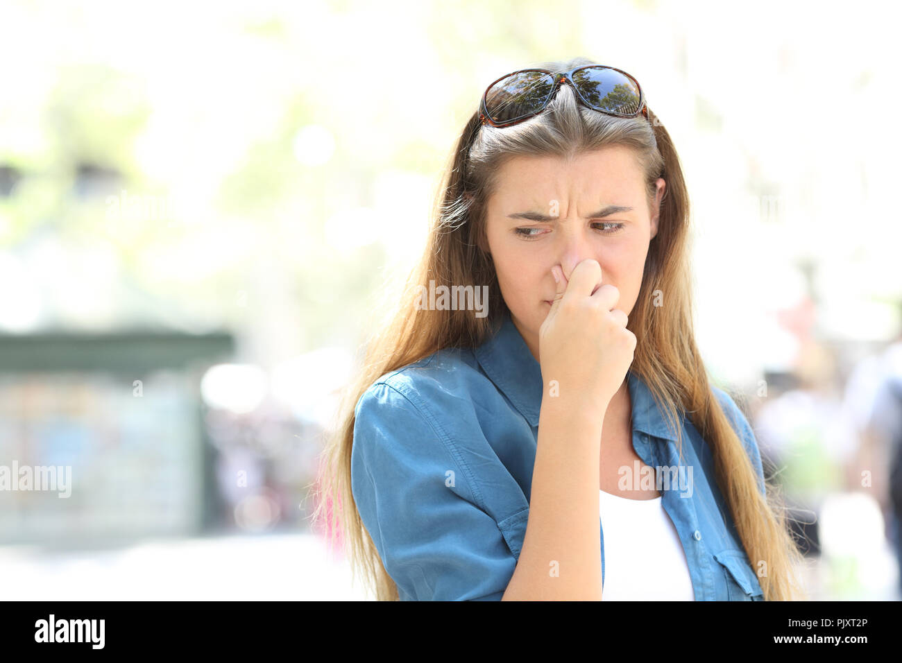 Covering nose hi-res stock photography and images - Alamy