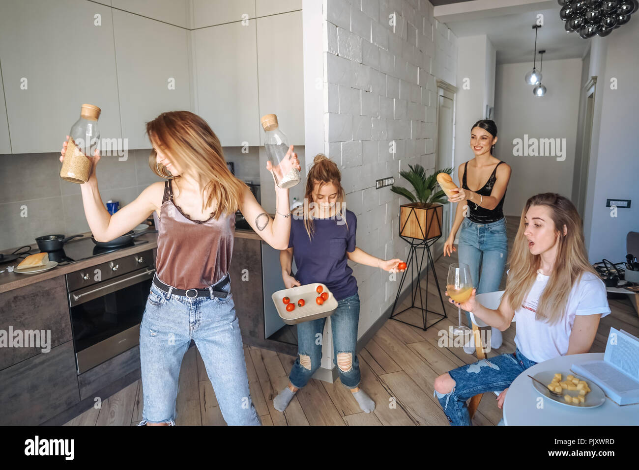 group of women in the kitchen Stock Photo - Alamy