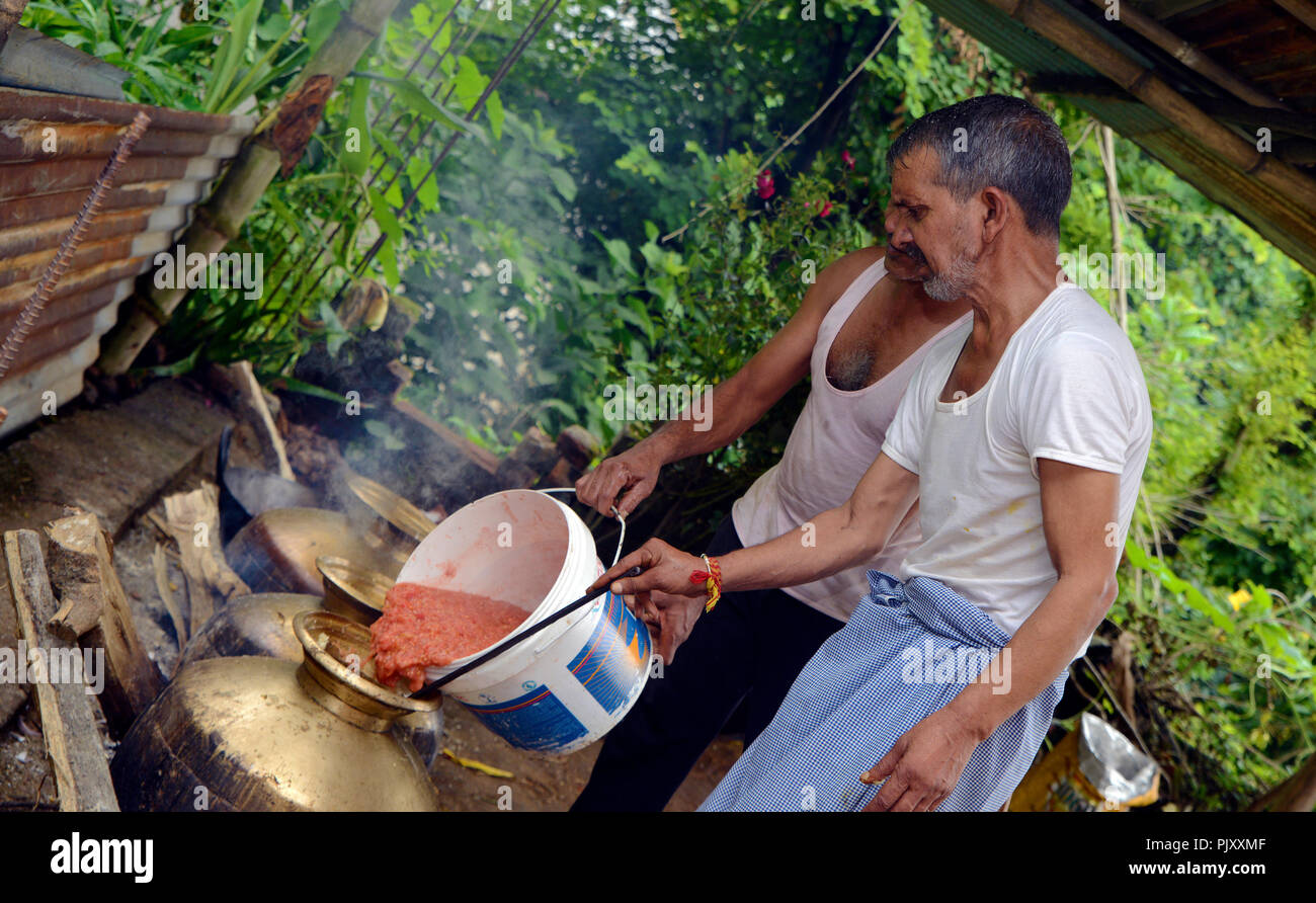 Cooking Food Outdoors Using Fire Woods in Village Stock Photo - Alamy