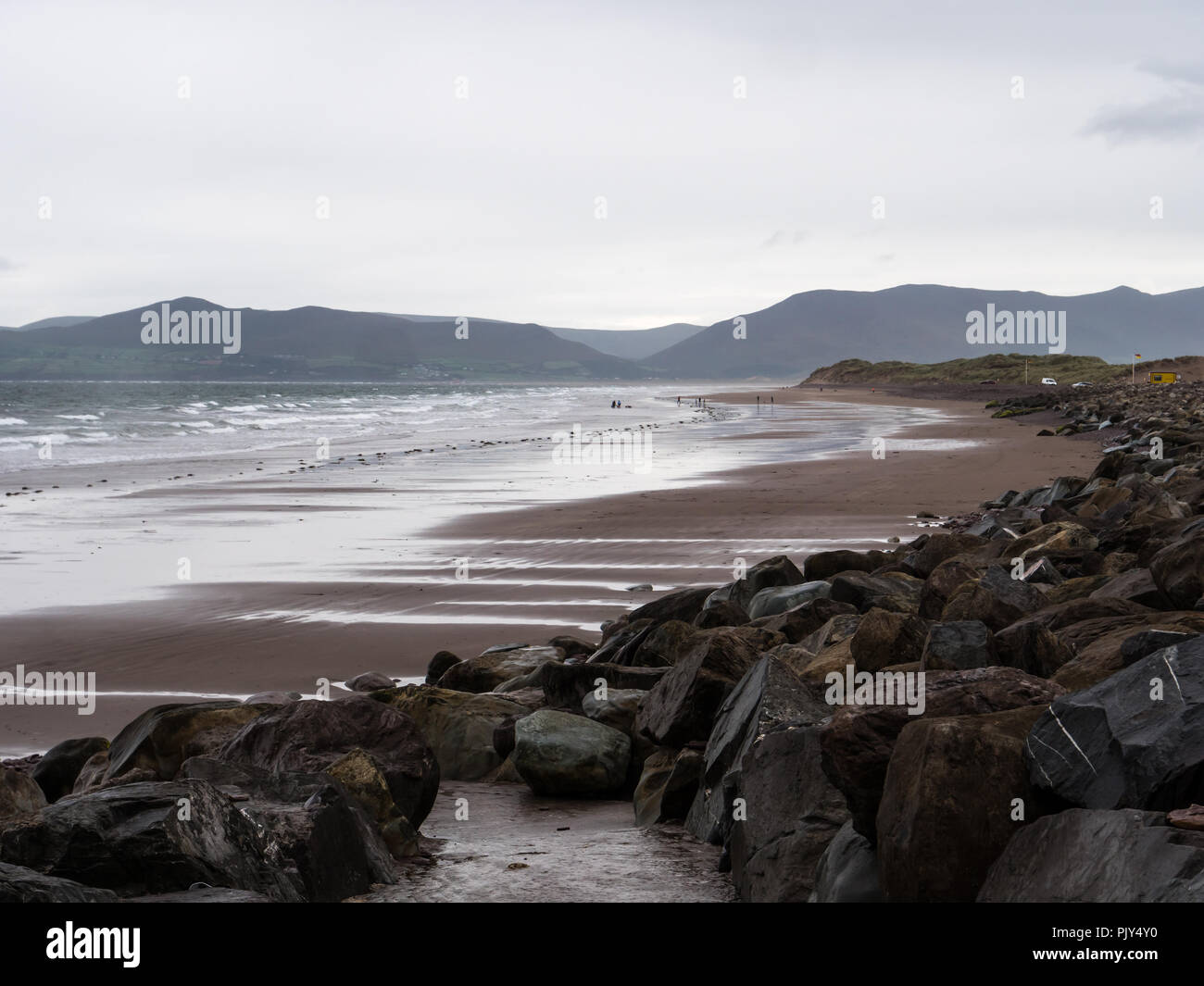 Rossbeigh beach in Ireland on a rainy day with greey clouds Stock Photo ...