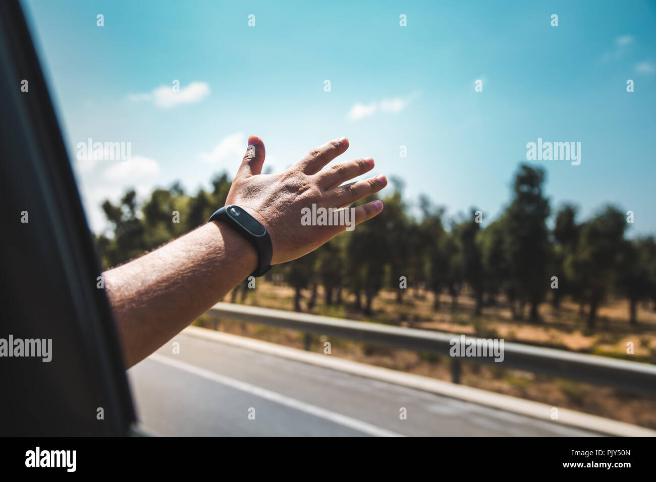 Person waving from car hi-res stock photography and images - Alamy