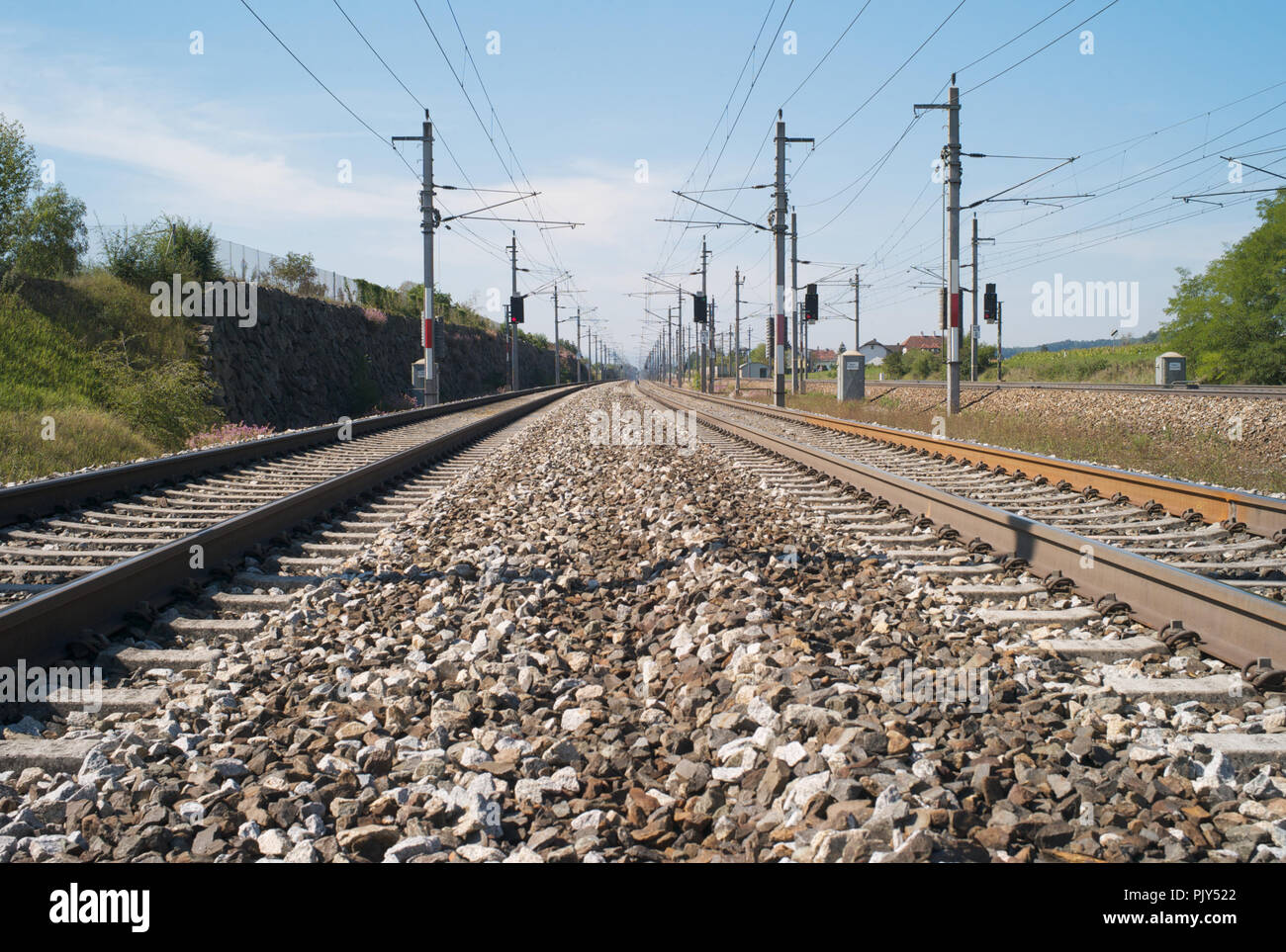 Railroad Tracks in the Field Stock Photo - Alamy