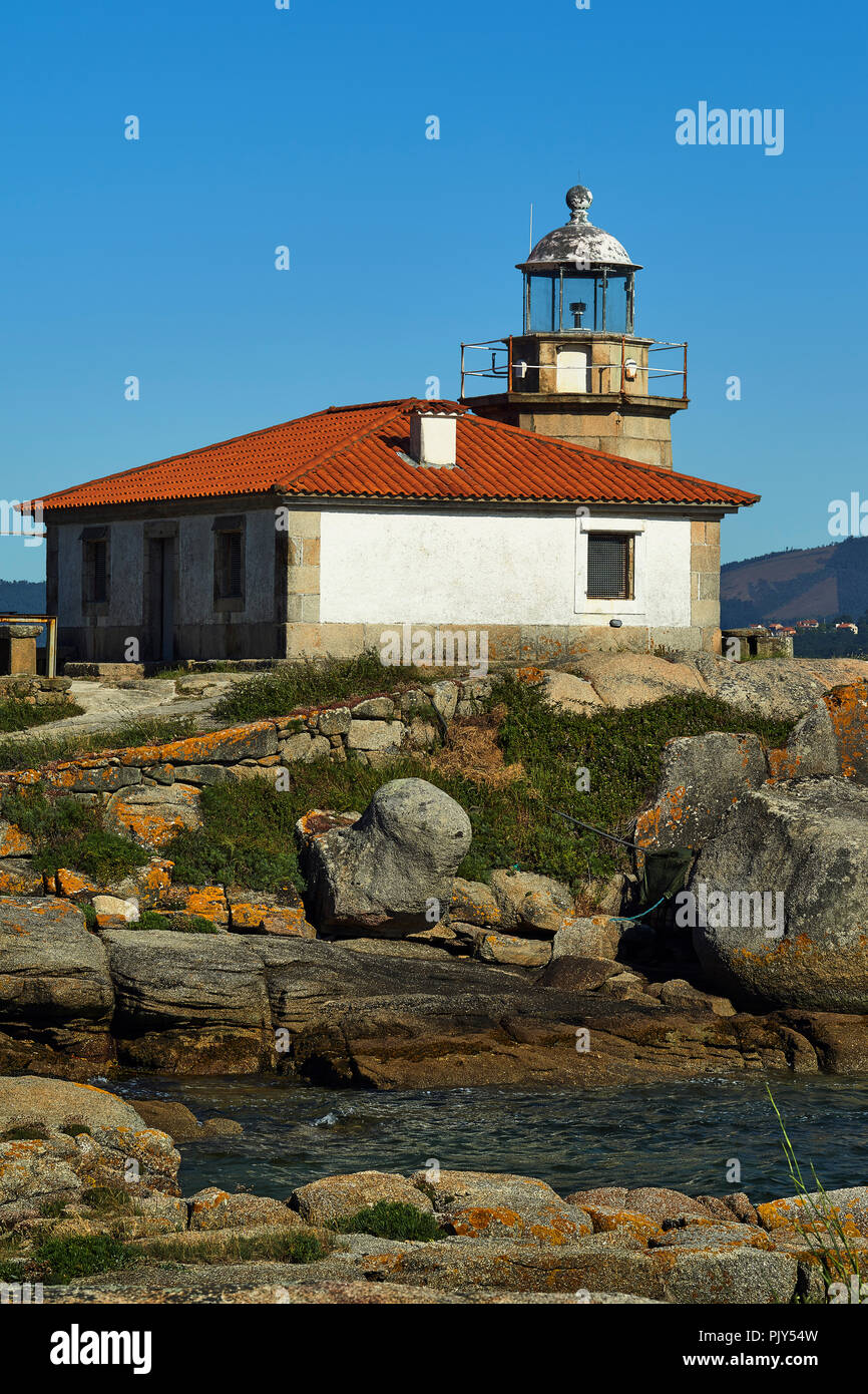 Lighthouse of Punta Cabalo on the island of Arosa, which is located in ...