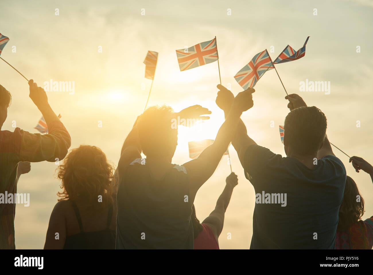 Hand waving british flag hi-res stock photography and images - Alamy