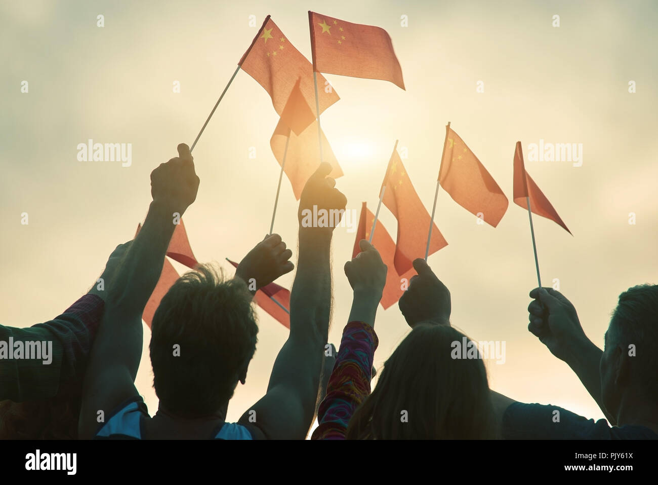 People waving chineese flags Stock Photo - Alamy