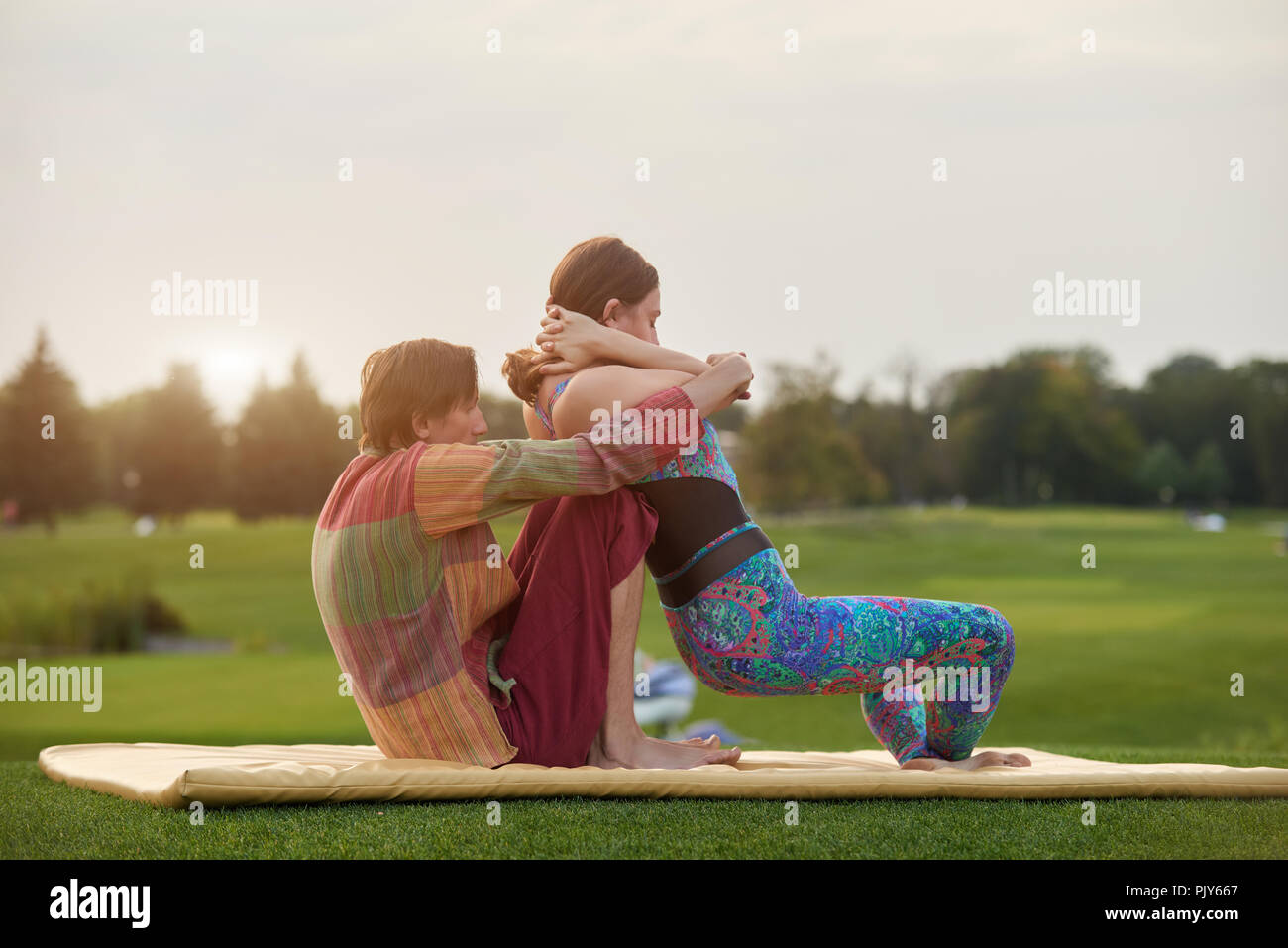 Woman is getting thai massage stretching position Stock Photo - Alamy