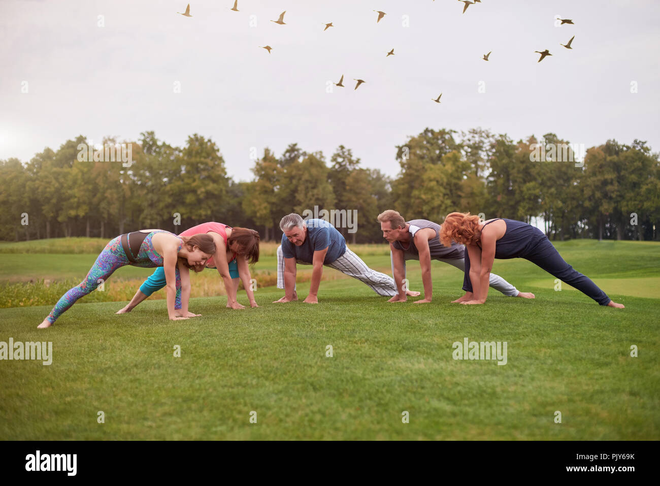 Leg stretching workout exercise outdoor Stock Photo - Alamy