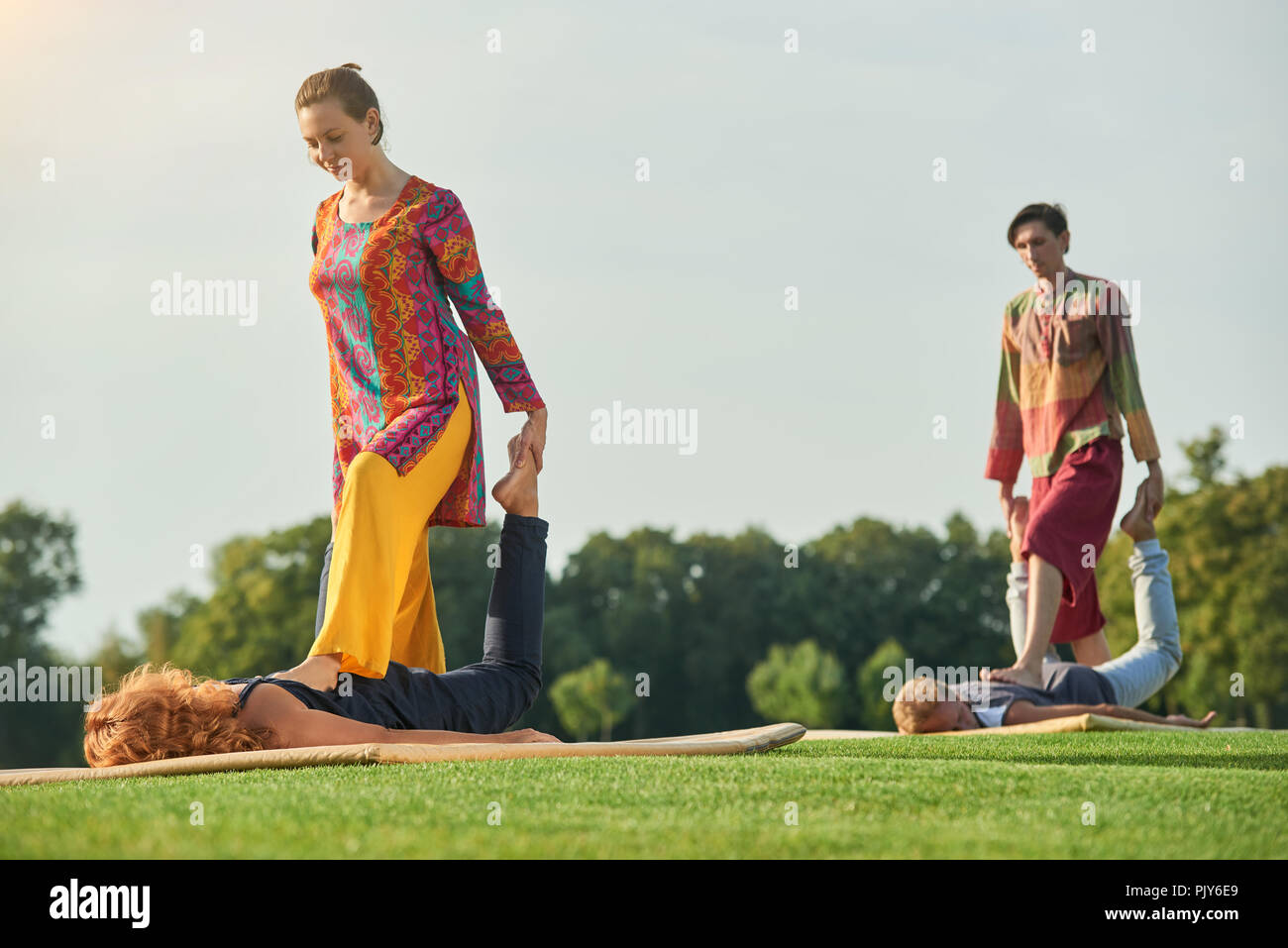Thai massage, foot pressing back pose Stock Photo - Alamy