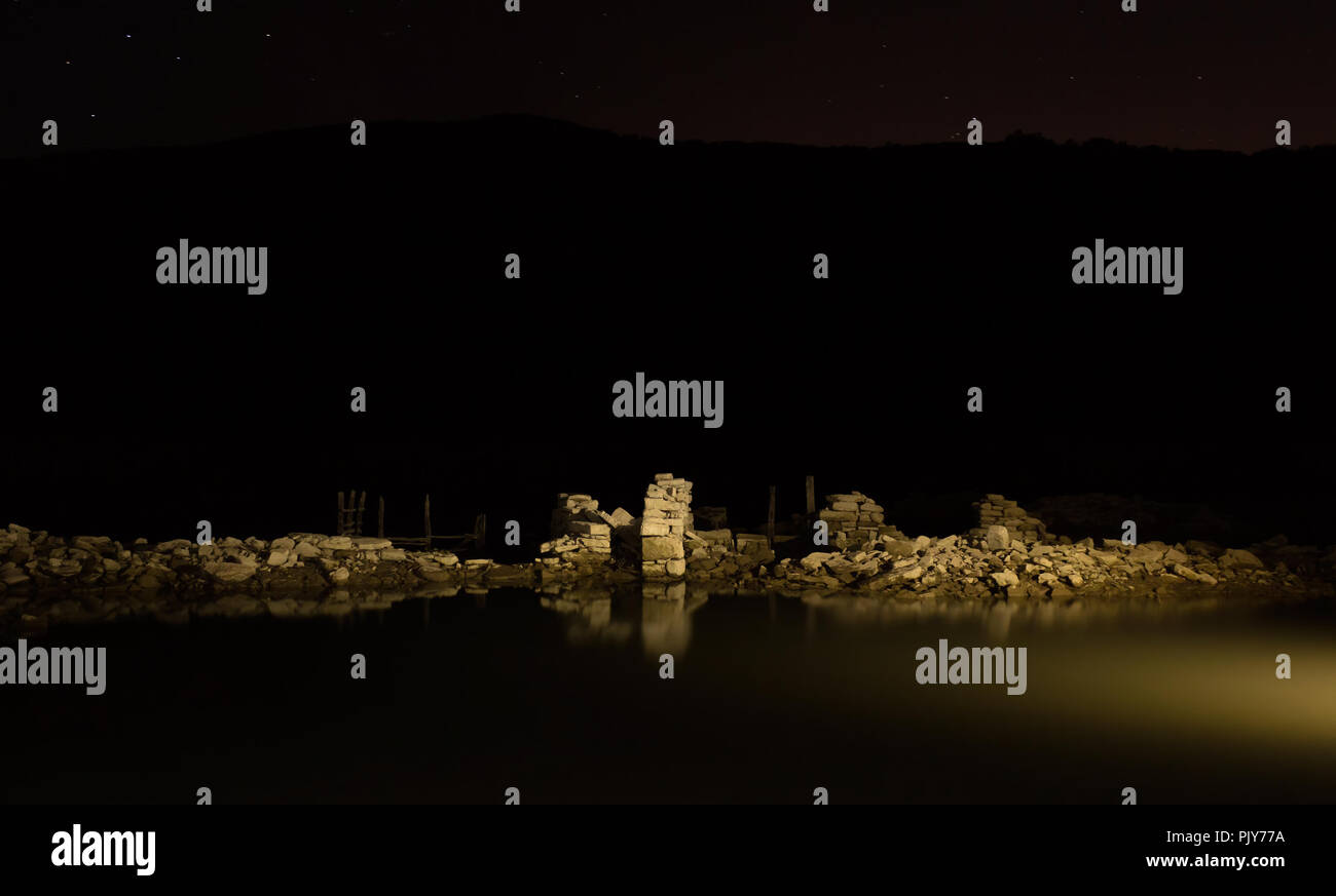 Spooky view during low water level of usually underwater ruins of ...
