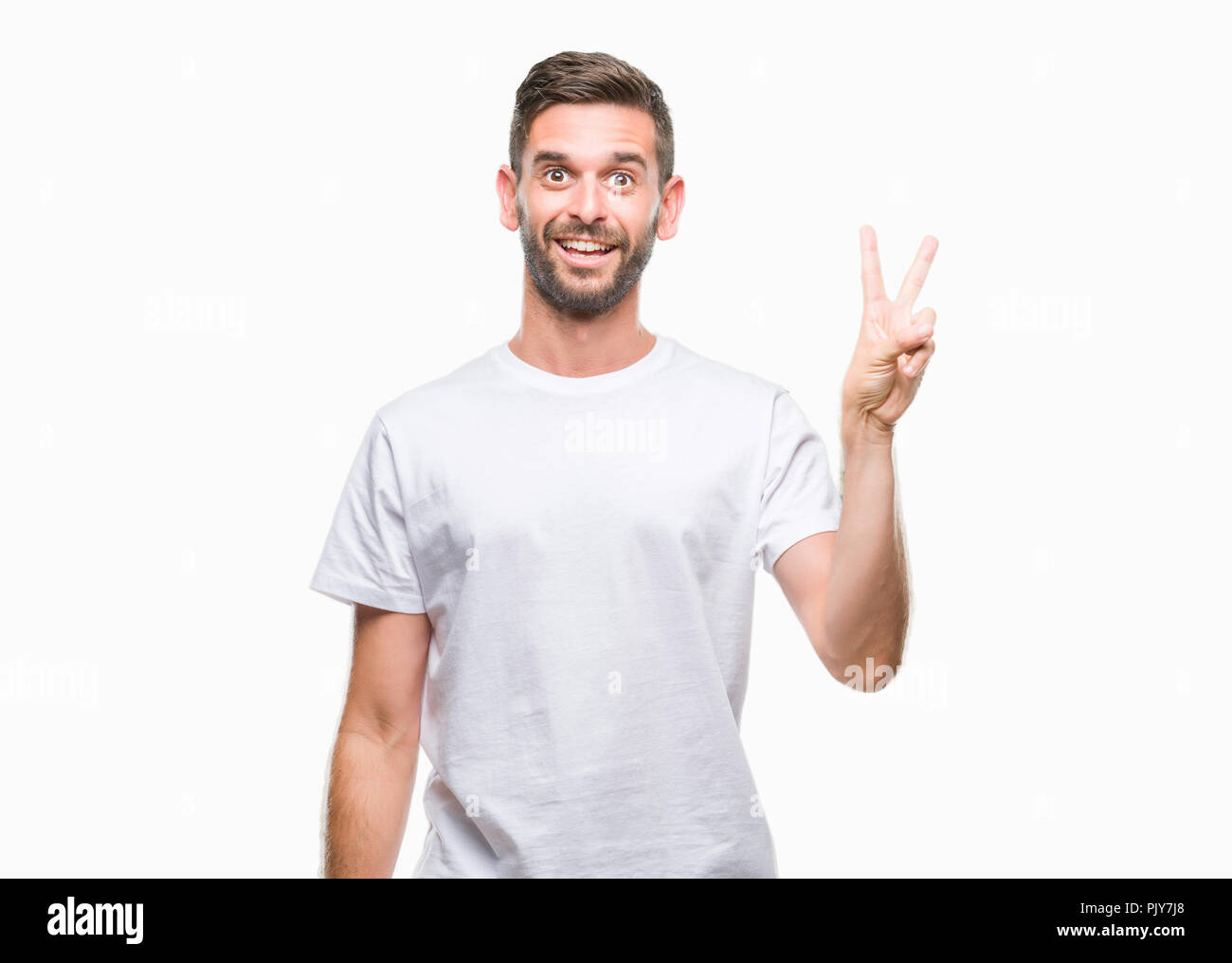 Young handsome man over isolated background smiling with happy face ...