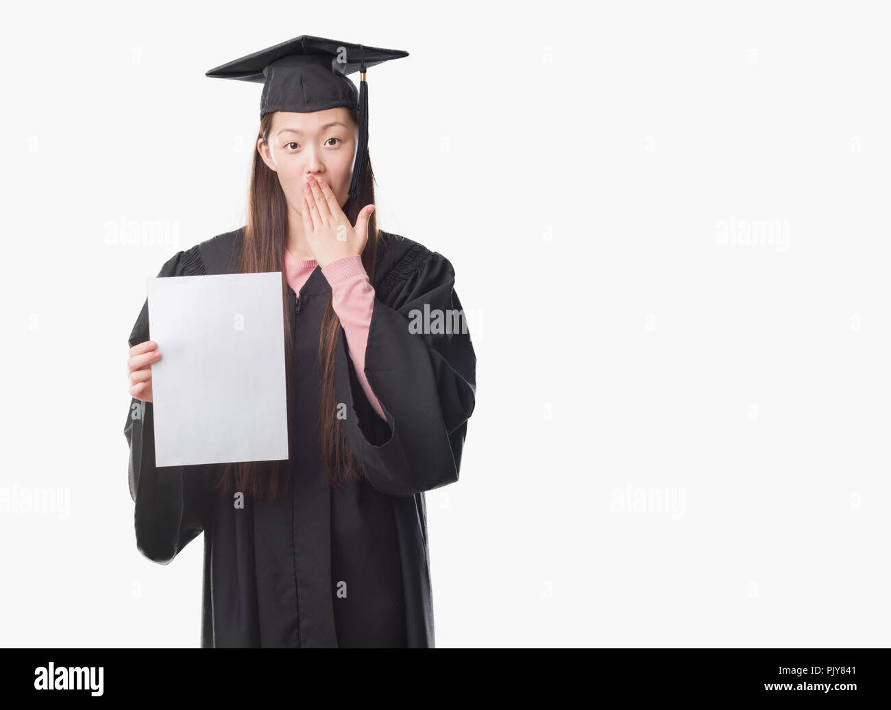 Young Chinese woman wearing graduate uniform holding paper degree cover ...