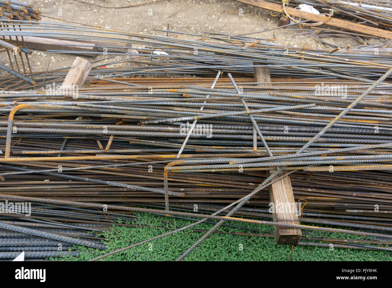Stacked materials on a construction site Stock Photo - Alamy