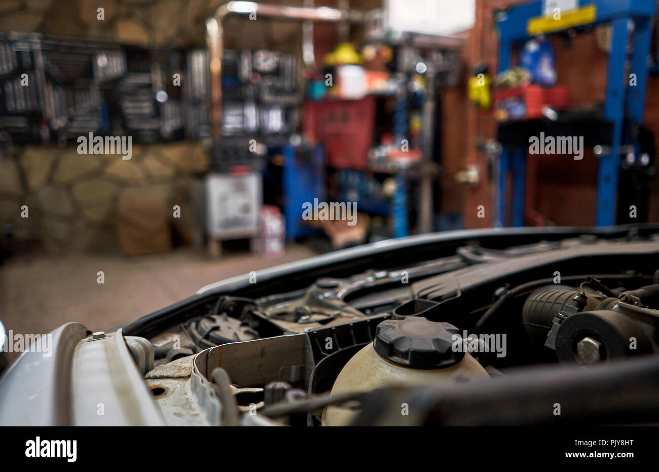 white car in the service station Stock Photo - Alamy