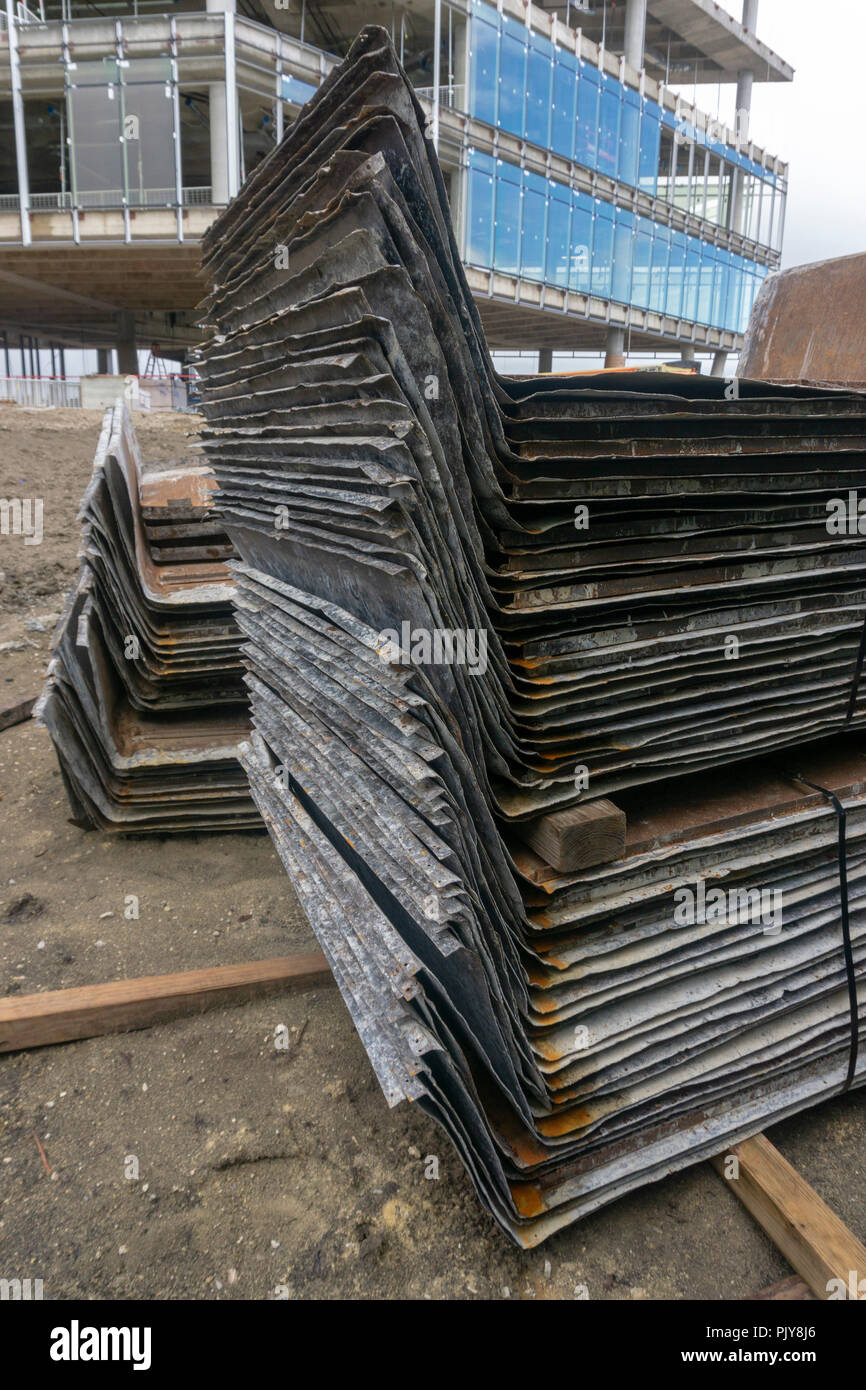 Stacked materials on a construction site Stock Photo - Alamy