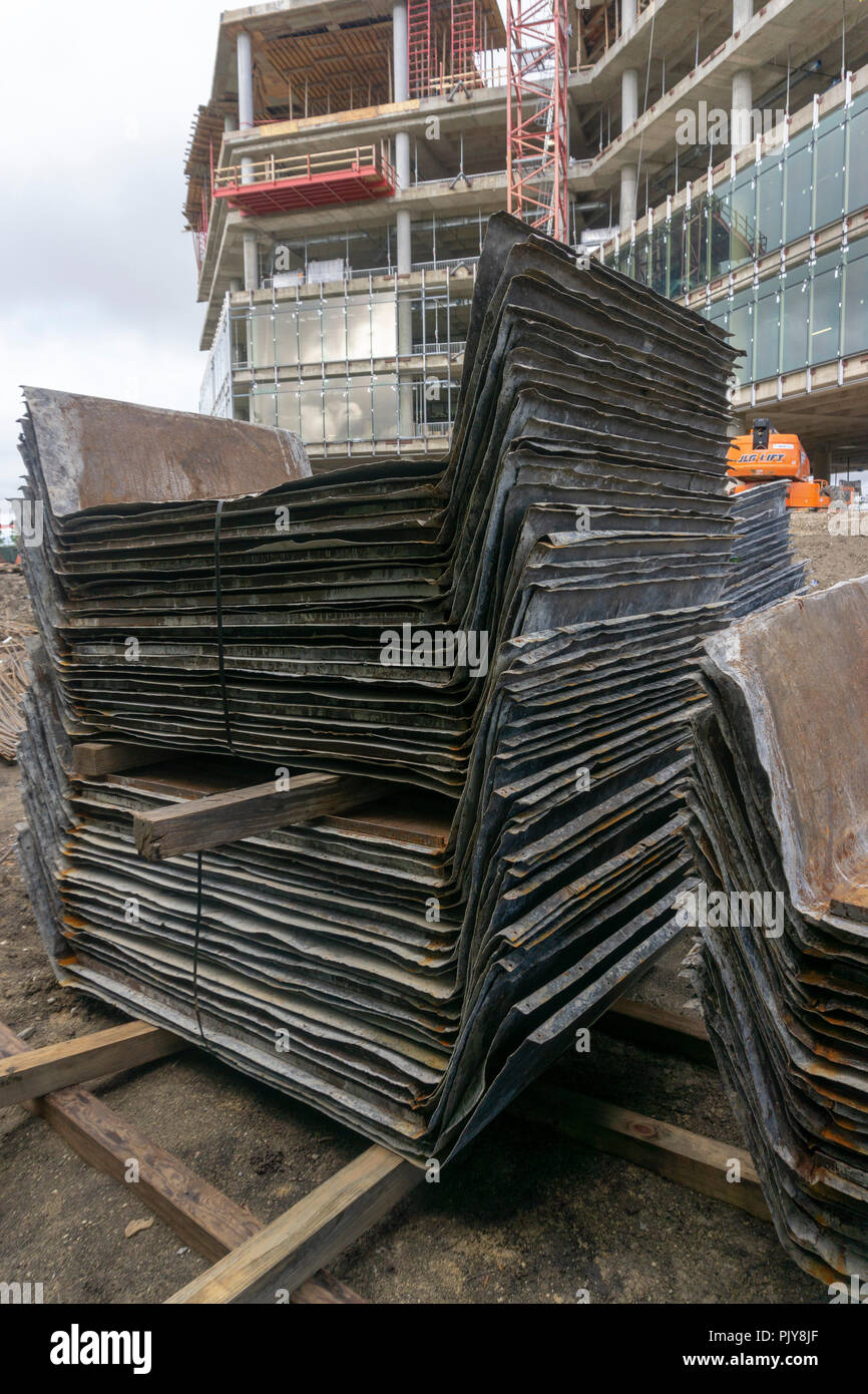 Stacked materials on a construction site Stock Photo - Alamy
