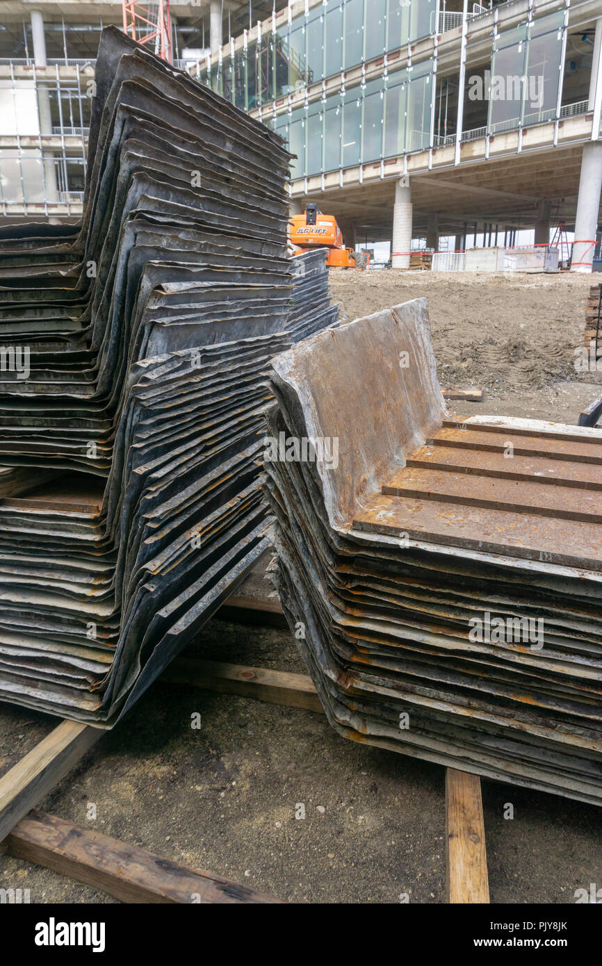 Stacked materials on a construction site Stock Photo - Alamy